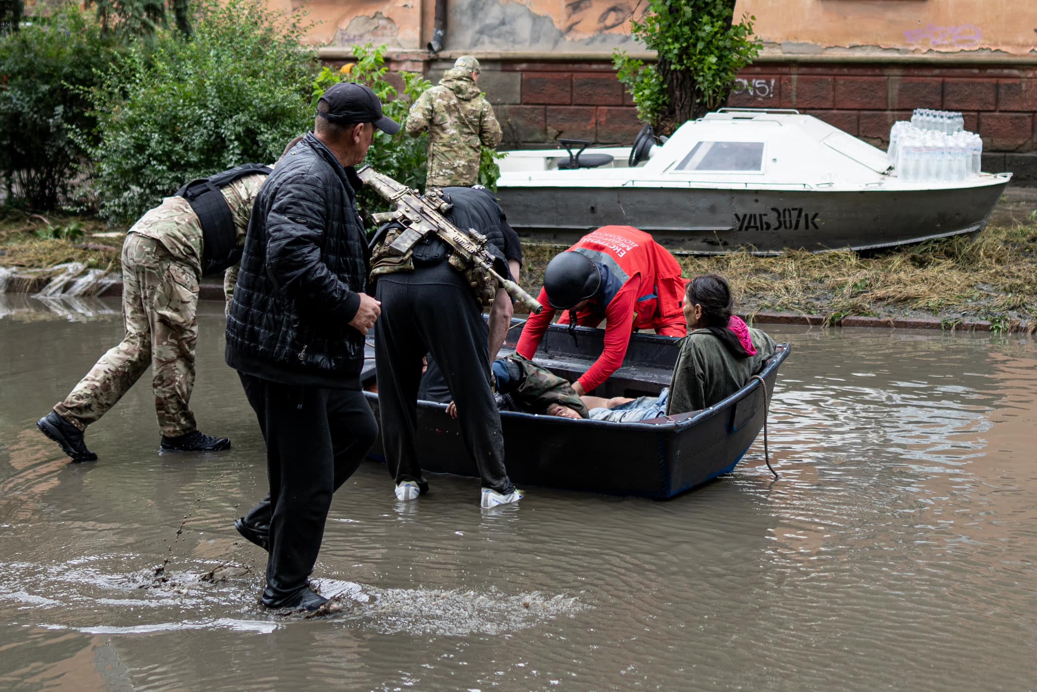 "More than 6,000 people have been evacuated from dozens of flooded ...